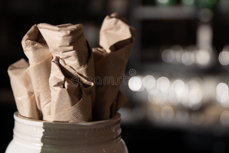 Rolled Silverware in a Mug stock image. Image of restuarant - 267374953