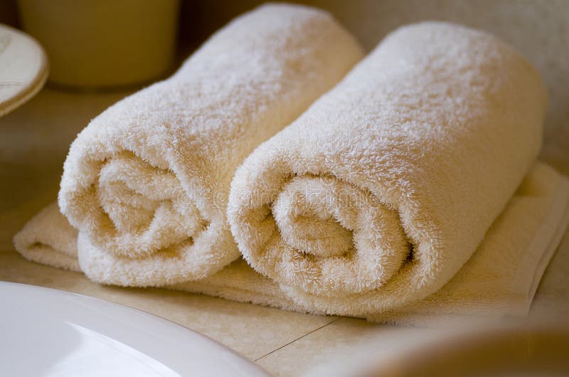 Rolled up bath towels stock image. Image of towelling - 63293011
