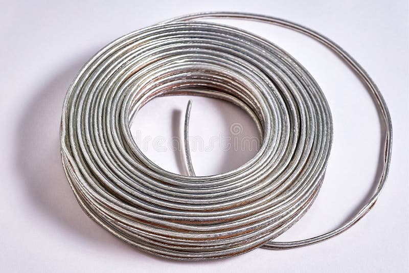 The Rolled-up Gray Cable is Shown in Close-up. Abstract Technological ...