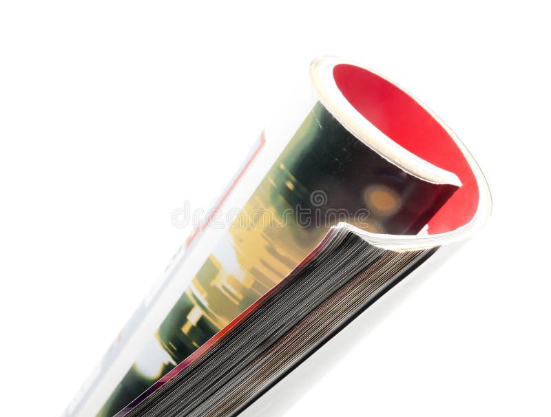 Rolled up magazine stock photo. Image of reading, tabloid - 274435630