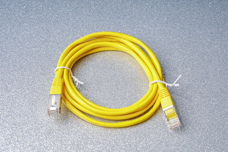 Rolled Up Yellow Network Cable or Patch Cable As a Still Life and Close ...