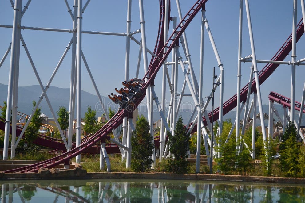 A Roller Coaster with an Artificial Lake Stock Image - Image of blue ...