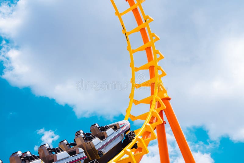 Roller Coaster High in the Summer Sky at Theme Park Most Excited Fun ...