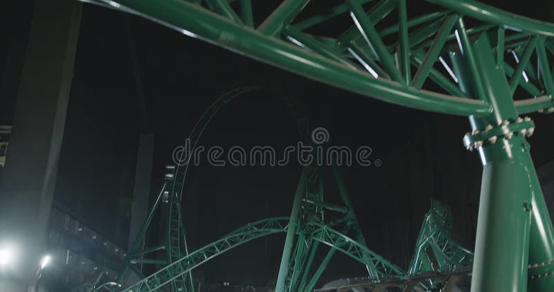 Roller Coaster Structure in a Dark Pavilion. Ride Tracks Stock Footage ...