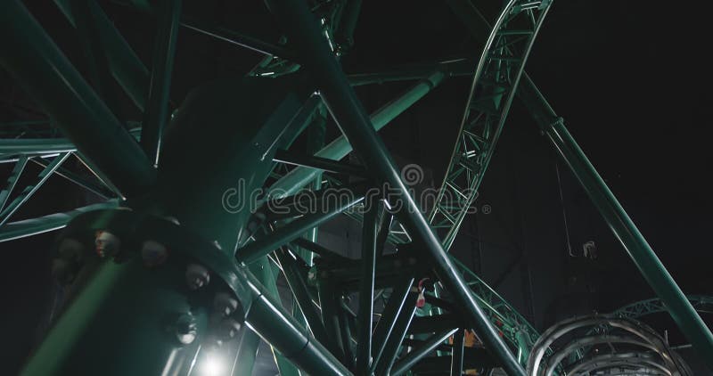 Roller Coaster Structure in a Dark Pavilion. Ride Tracks Stock Video ...