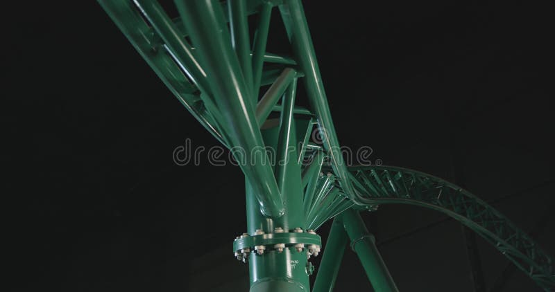 Roller Coaster Structure in a Dark Pavilion. Ride Tracks Stock Video ...