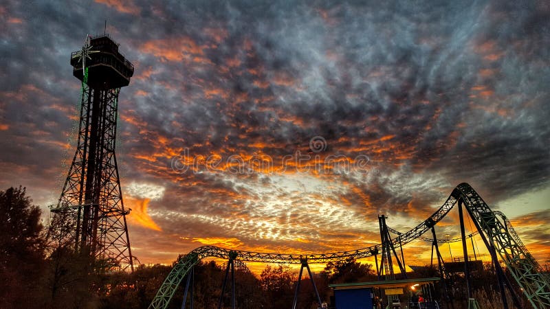 Roller coaster sunset stock photo. Image of sunset, roller - 102950660
