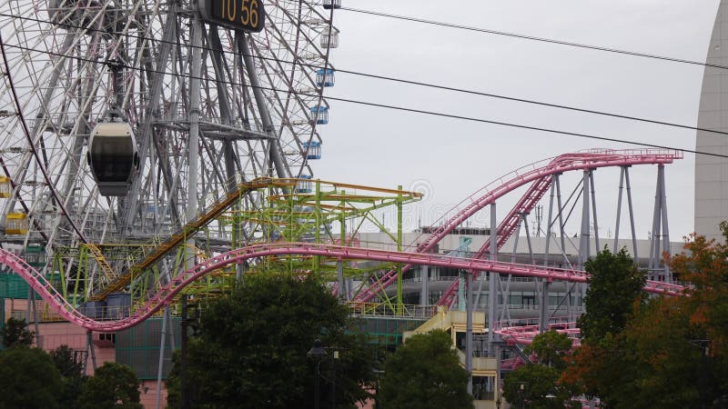 Roller Coasters, Rotating Ferris Wheels, and Gondolas are Fun Stock ...