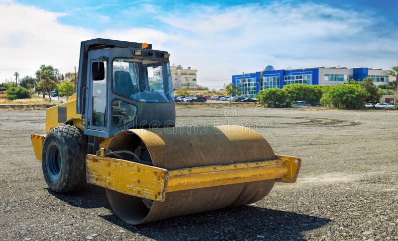 Roller Compactor Machine Flattens the Asphalt Stock Photo - Image of ...
