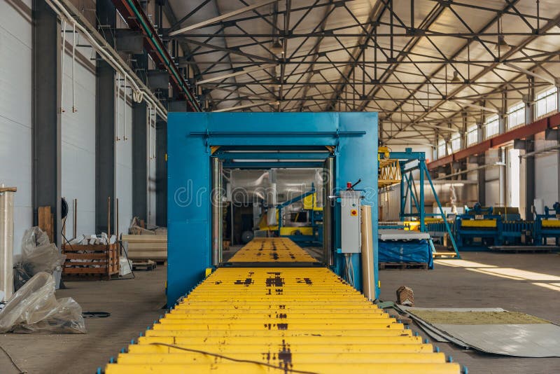 Roller Conveyor and Packing Machine Stock Photo - Image of industry ...