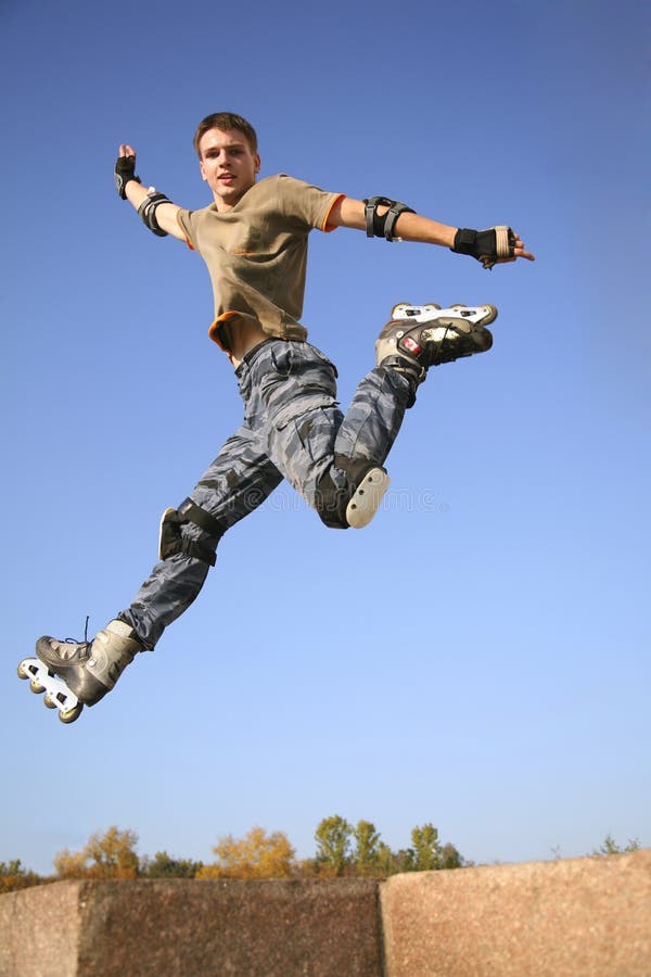 Active roller boy jumping stock image. Image of rollerskate - 3548135