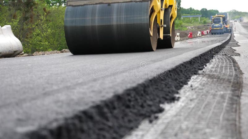 Roller Laying New Asphalt Layer. Special Machinery Making Road ...