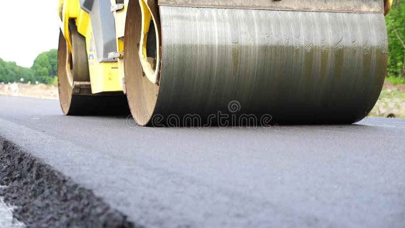Roller Laying New Asphalt Layer. Special Machinery Making Road ...