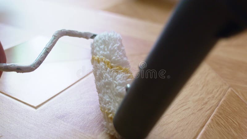 The Roller for Painting the Walls with Paint is Vacuumed. Stock Footage ...