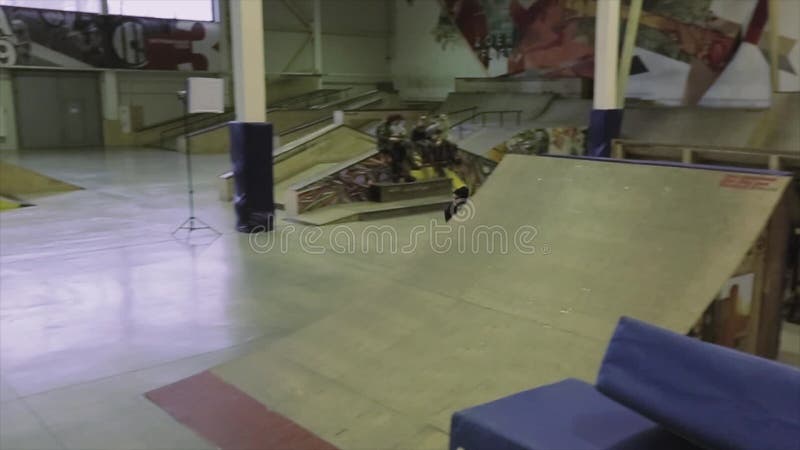 Roller Skater Accelerate from Vertical Springboard Make High Jump ...