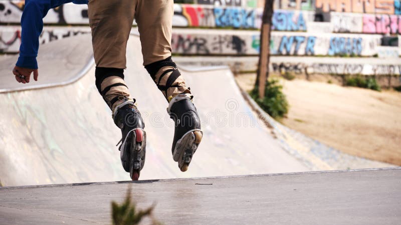 Roller Skater Jumping in a Half Pipe in an Urban Skate Park Stock Photo ...