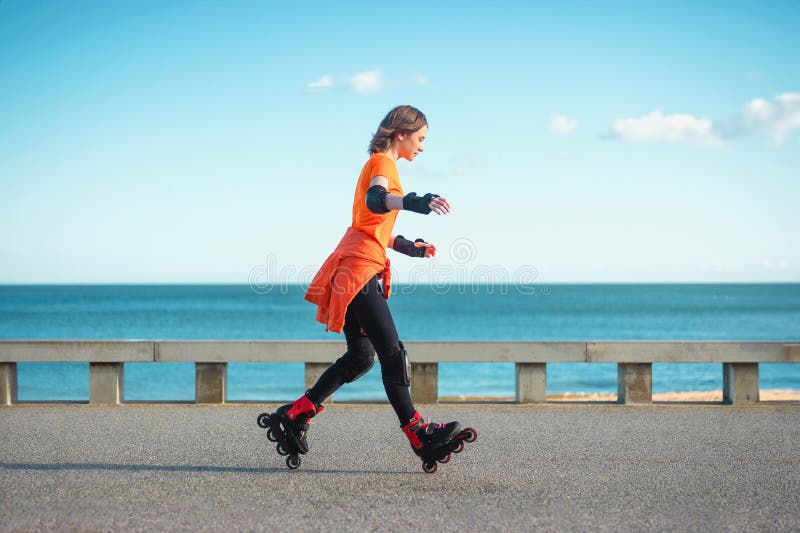 Roller Skating Girl Kid in Park Rollerblading on Inline Skates. Stock ...
