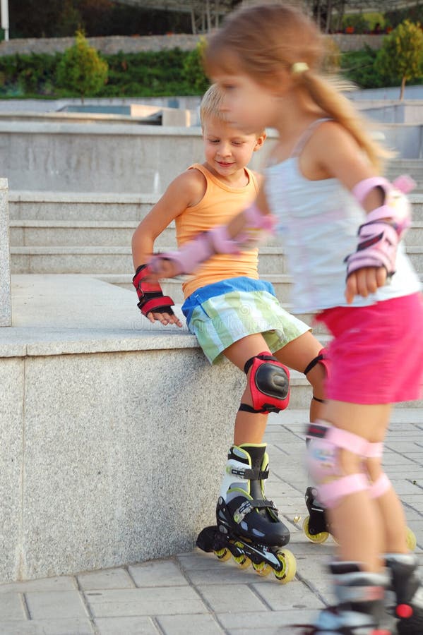 Rollerblading children. stock image. Image of pads, child - 14543121