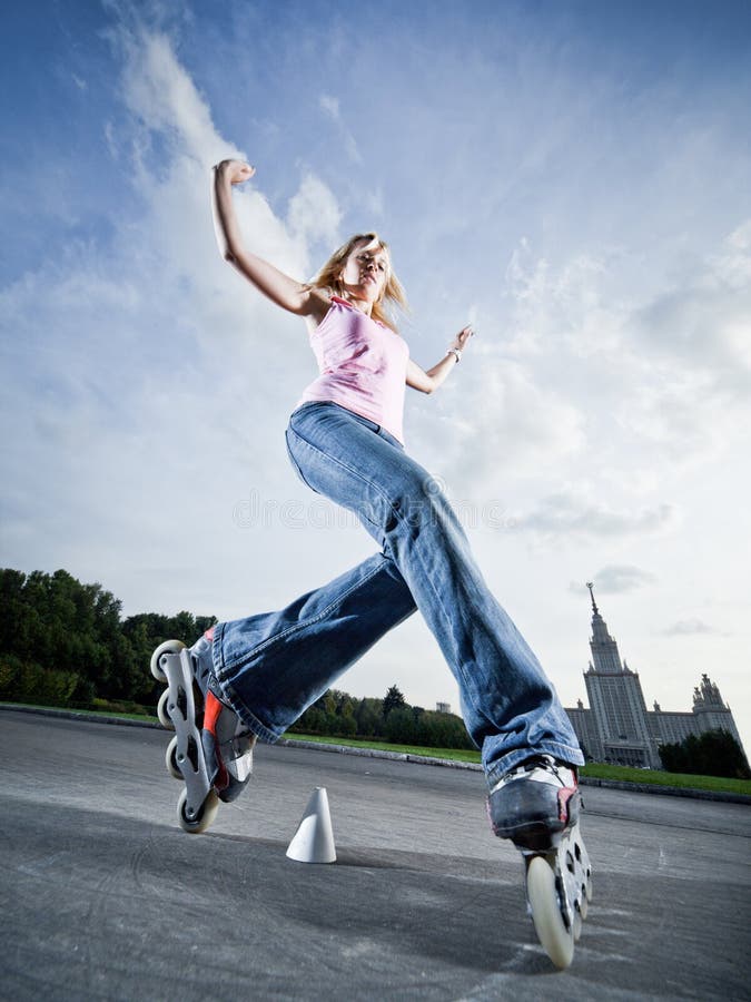 Rollerblading girl stock image. Image of jeans, rollerblading - 11487421
