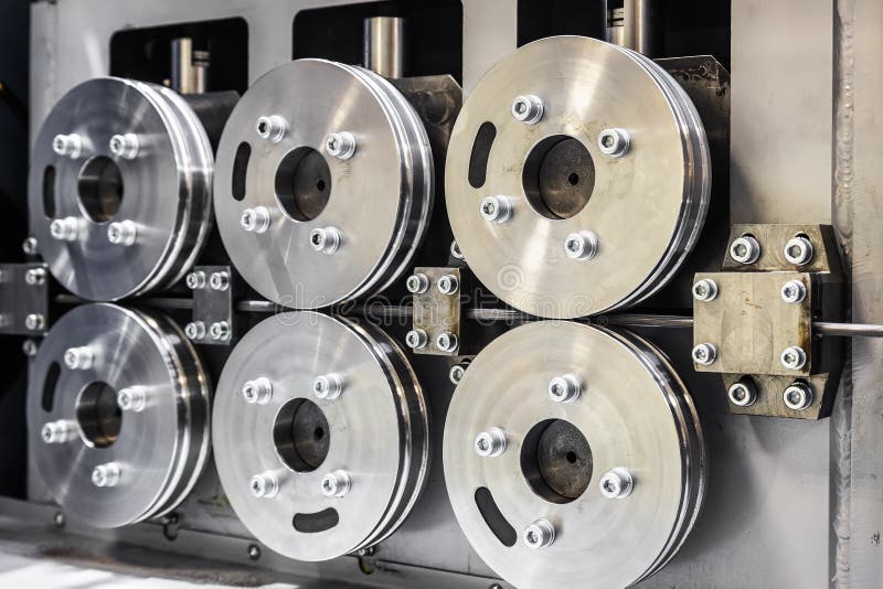 Rollers at the Machine for Straightening the Metal Bar Stock Photo ...