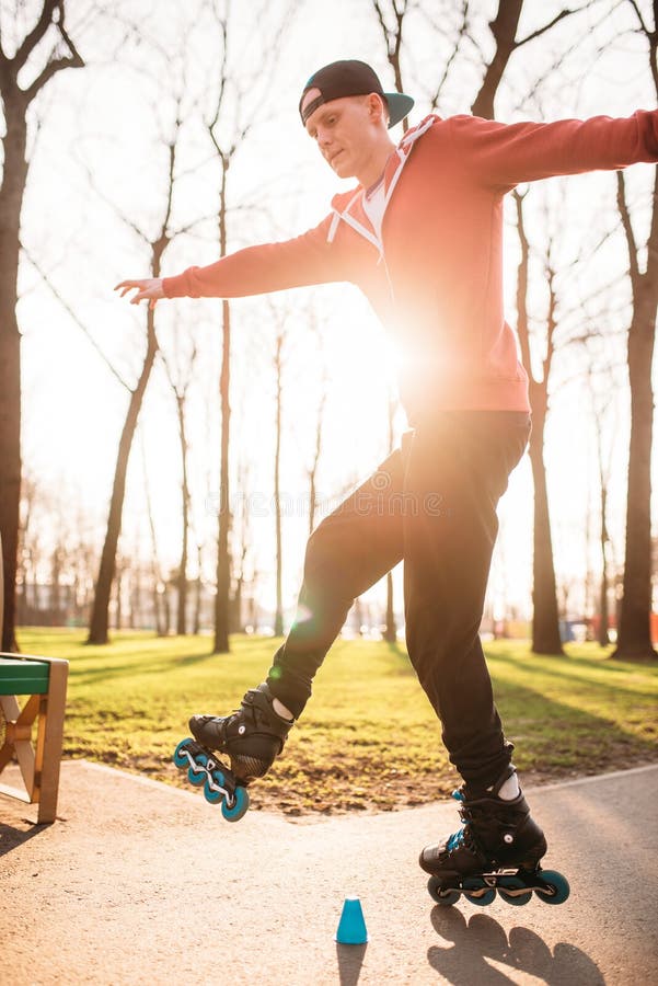 Rollerskater, Rollerskating Trick Exercise in Park Stock Image - Image ...