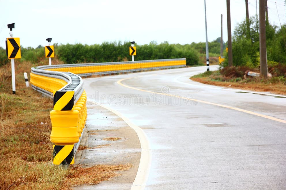 Rolling Barrier Guard Rail Install on Curve Lean Road Stock Photo ...