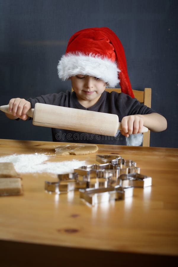 Rolling Christmas cookies stock image. Image of dough - 35871495