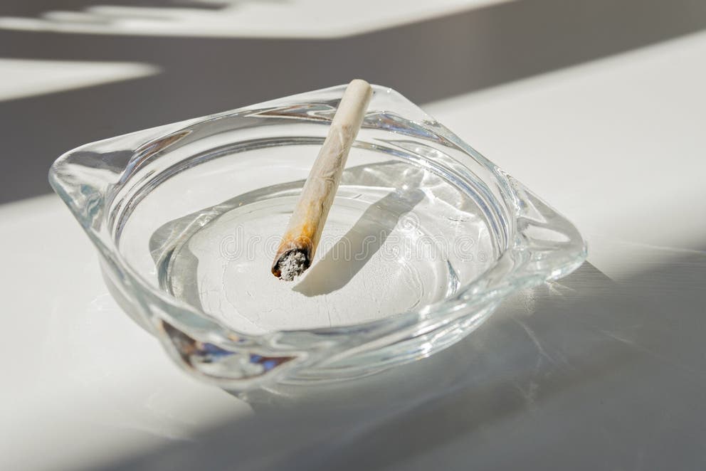 Rolling Cigarette Turned Off in an Ashtray. Smoking Concept Stock Photo - Image of tobacco ...