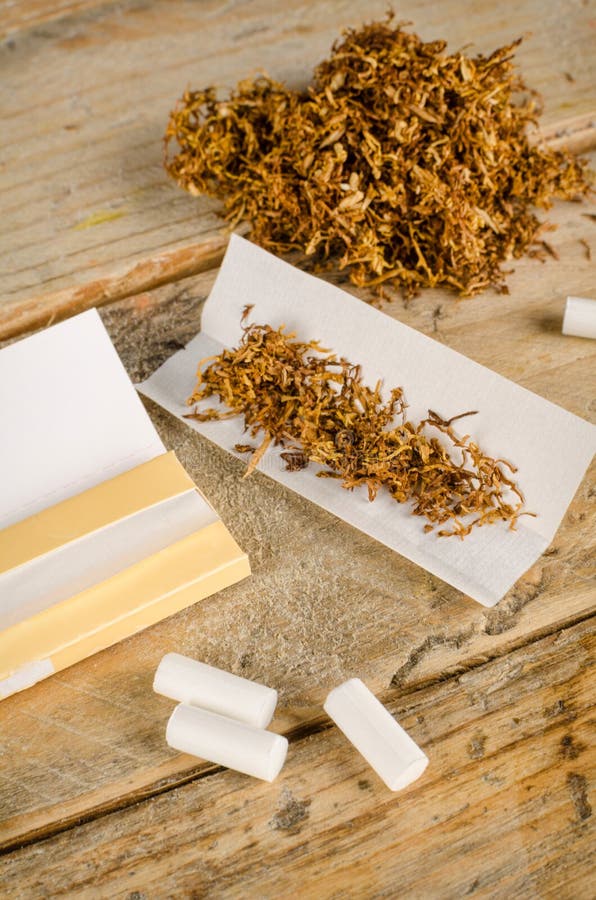 Rolling cigarettes stock image. Image of book, handmade - 63527997