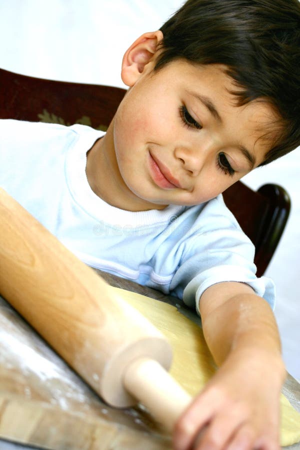 Rolling cookie dough stock photo. Image of process, flour - 2416478
