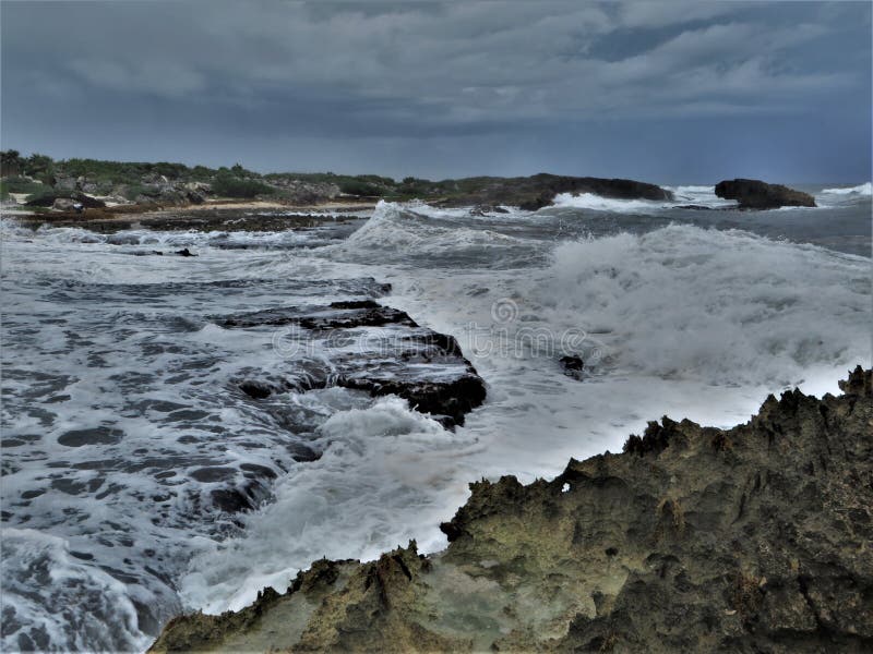 Rolling and Crashing Waves Over Rocks Stock Photo - Image of water ...