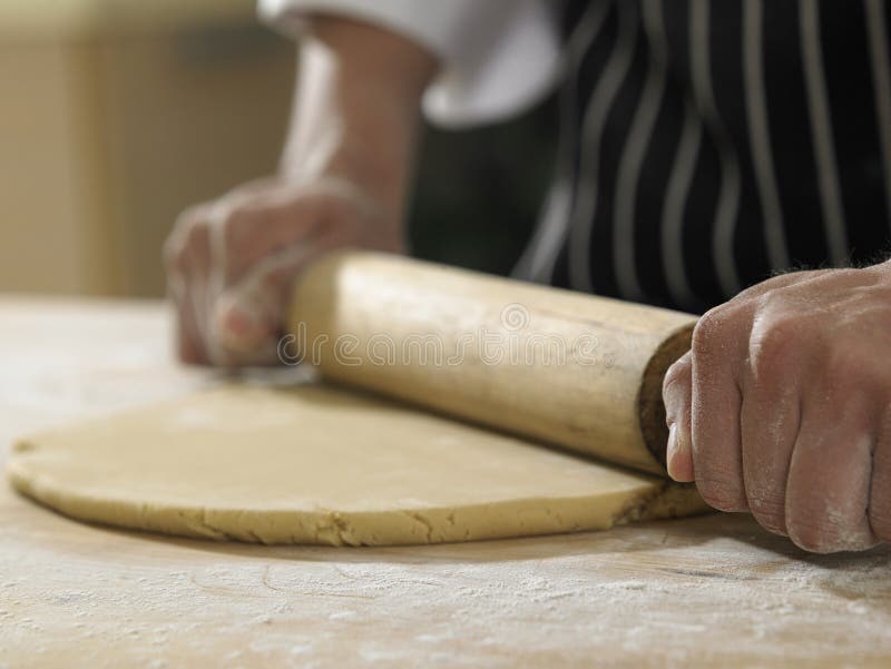 Baker Poured Flour on the Table for Rolling Dough Stock Image - Image ...