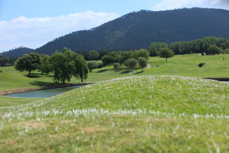 Rolling Greens and Water Feature on a Golf Course Stock Image - Image ...