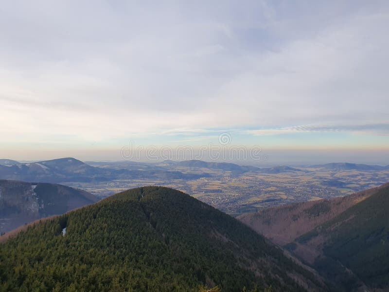 Rolling Hills Covered in Dense Green Forests Stretch into the Distance ...