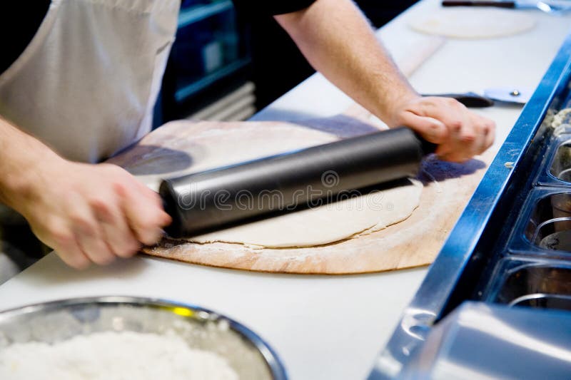Rolling Out Dough With Motion Stock Photo - Image of kitchen, cooking ...
