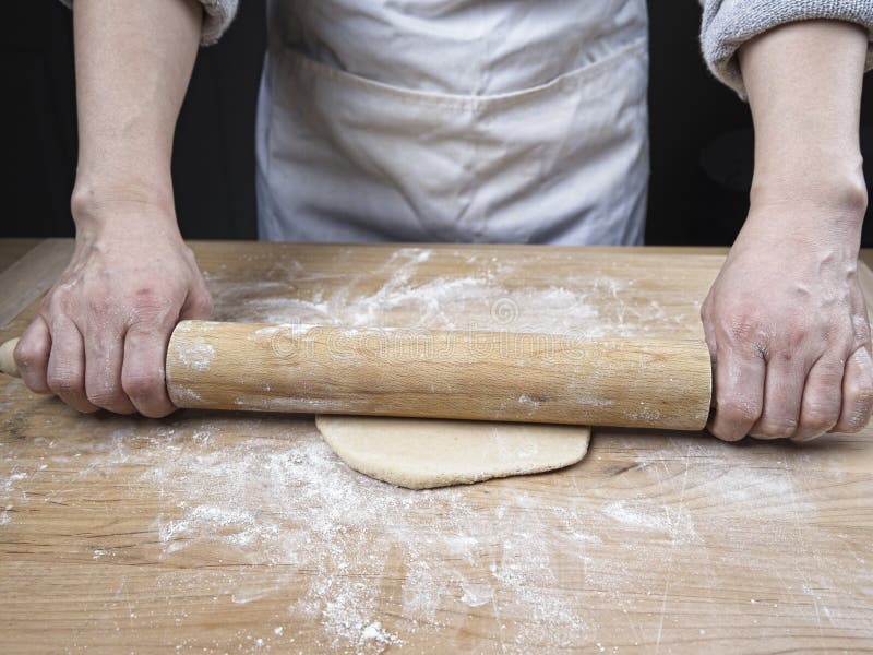 Rolling Out Dough with a Pin Stock Image - Image of cooking, bread ...