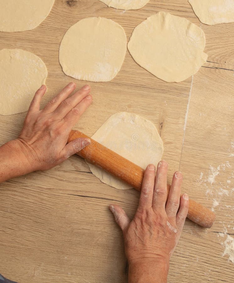 Rolling Out the Dough with Your Hands. Stock Photo - Image of culinary ...