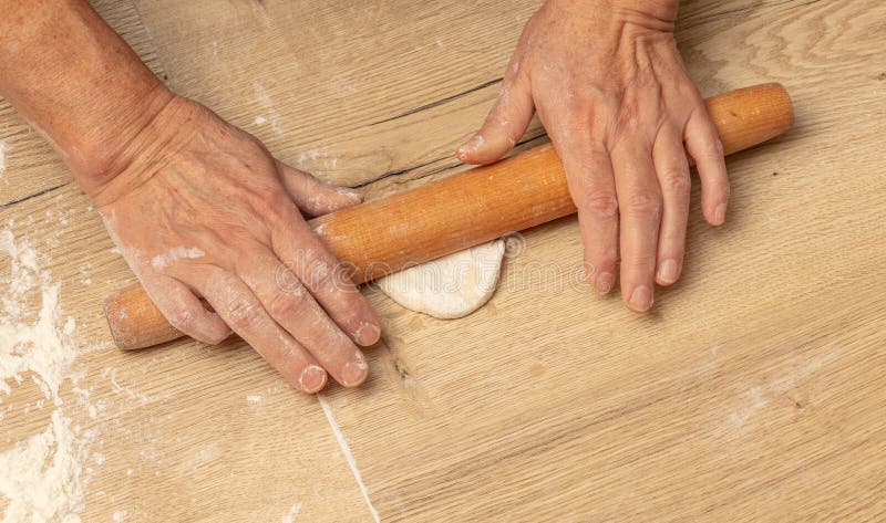 Rolling Out the Dough with Your Hands. Stock Photo - Image of healthy ...