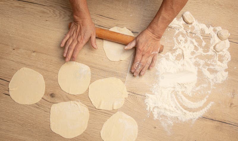 Rolling Out the Dough with Your Hands. Stock Image - Image of christmas ...
