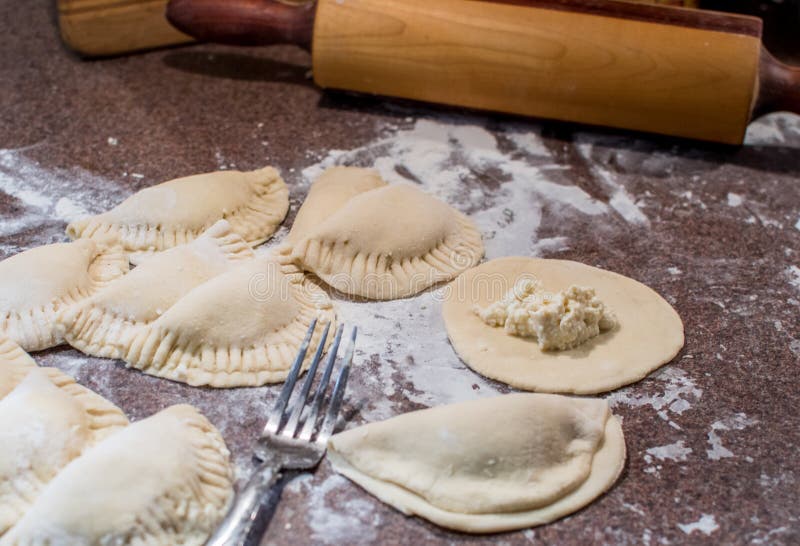 Rolling Out Fresh Pasta and Stuffing with Cheese Stock Image - Image of ...