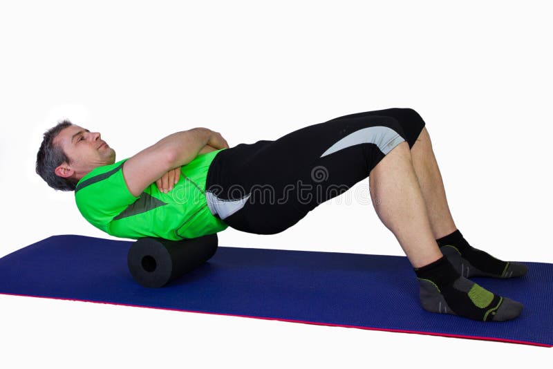 Rolling Out with a Pilates Roll Stock Photo - Image of effort ...