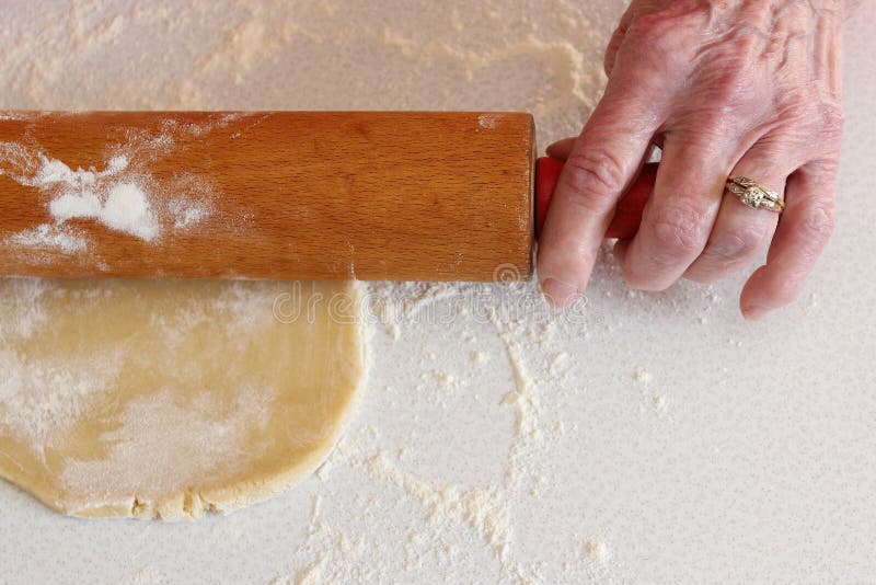 Rolling out sugar cookies stock photo. Image of baked - 91750770