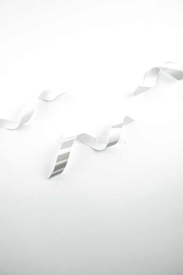 Rolling Paper Pieces on a White Background. Abstract Wallpapers from ...