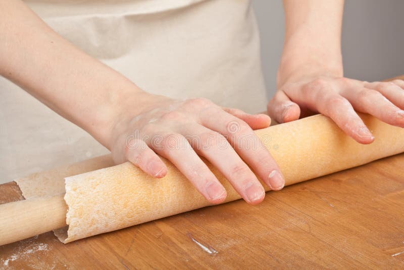 Rolling Pastry on Wooden Table Stock Photo - Image of counter, beat ...
