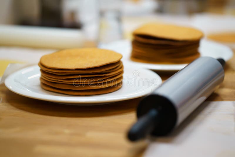 Rolling Pin with Cake on the Table. Make the Cakes. Close Up Stock ...
