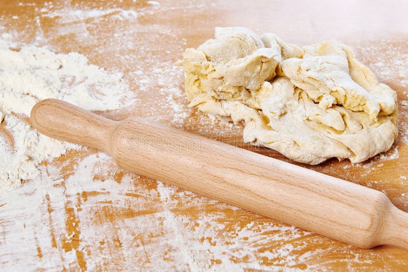 Rolling Pin and Dough on Kitchen Table Stock Image - Image of close ...