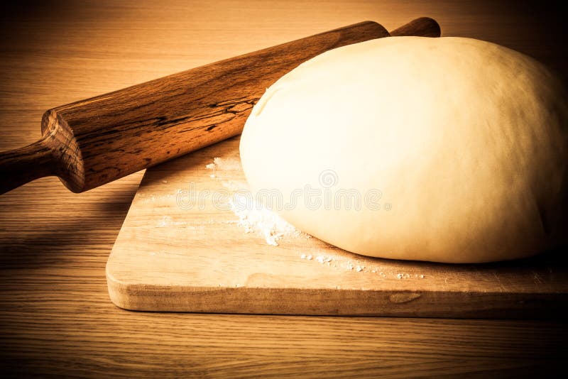 Rolling Pin and Dough on a Wooden Table. Slightly Tinted Stock Photo ...
