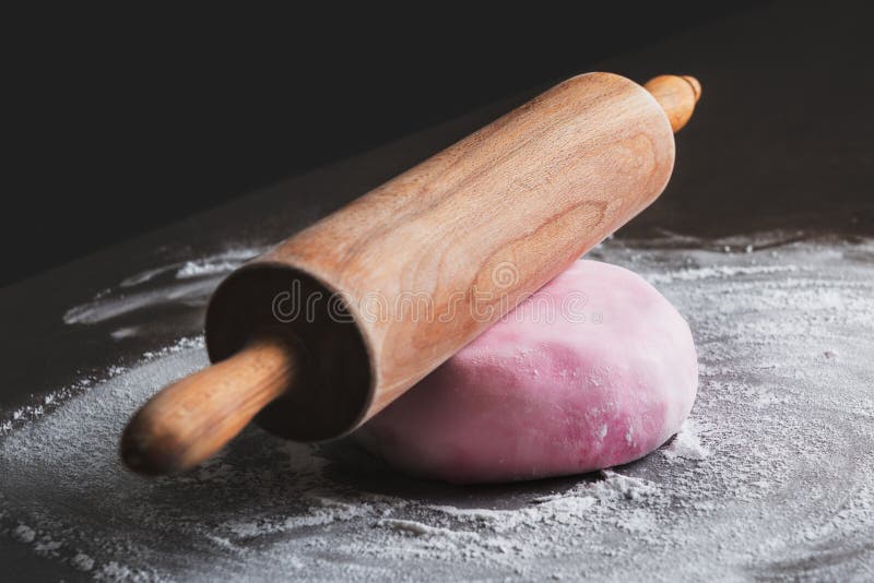 Rolling Pin and Pink Sugar Paste Stock Photo - Image of retail, cake ...