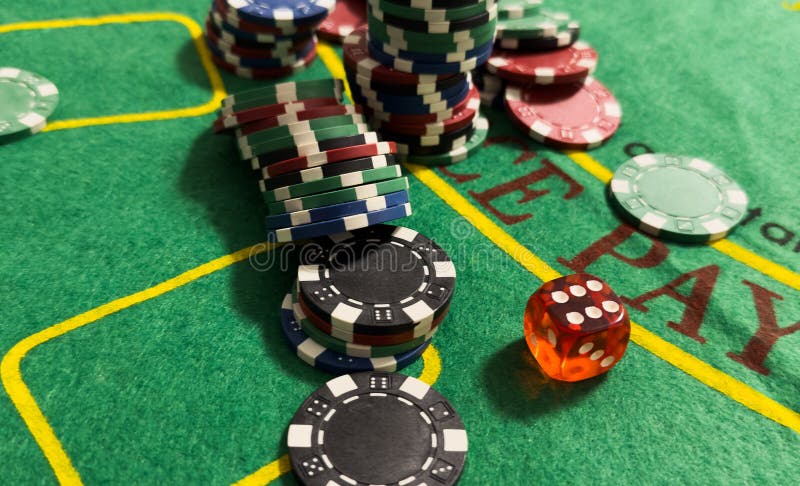 Rolling Red Dice on a Casino Table with Chips Stock Image - Image of ...