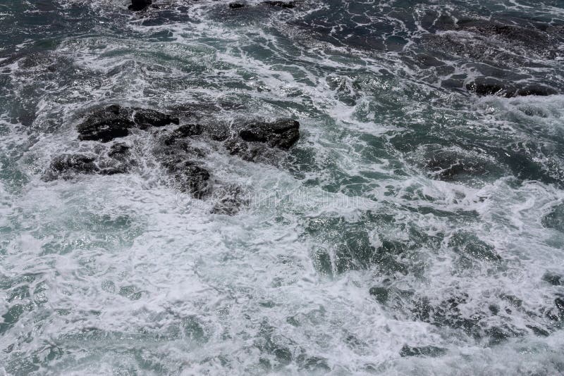 Waves Slamming into the Rocky Coast Line in Folegandros Stock Photo ...
